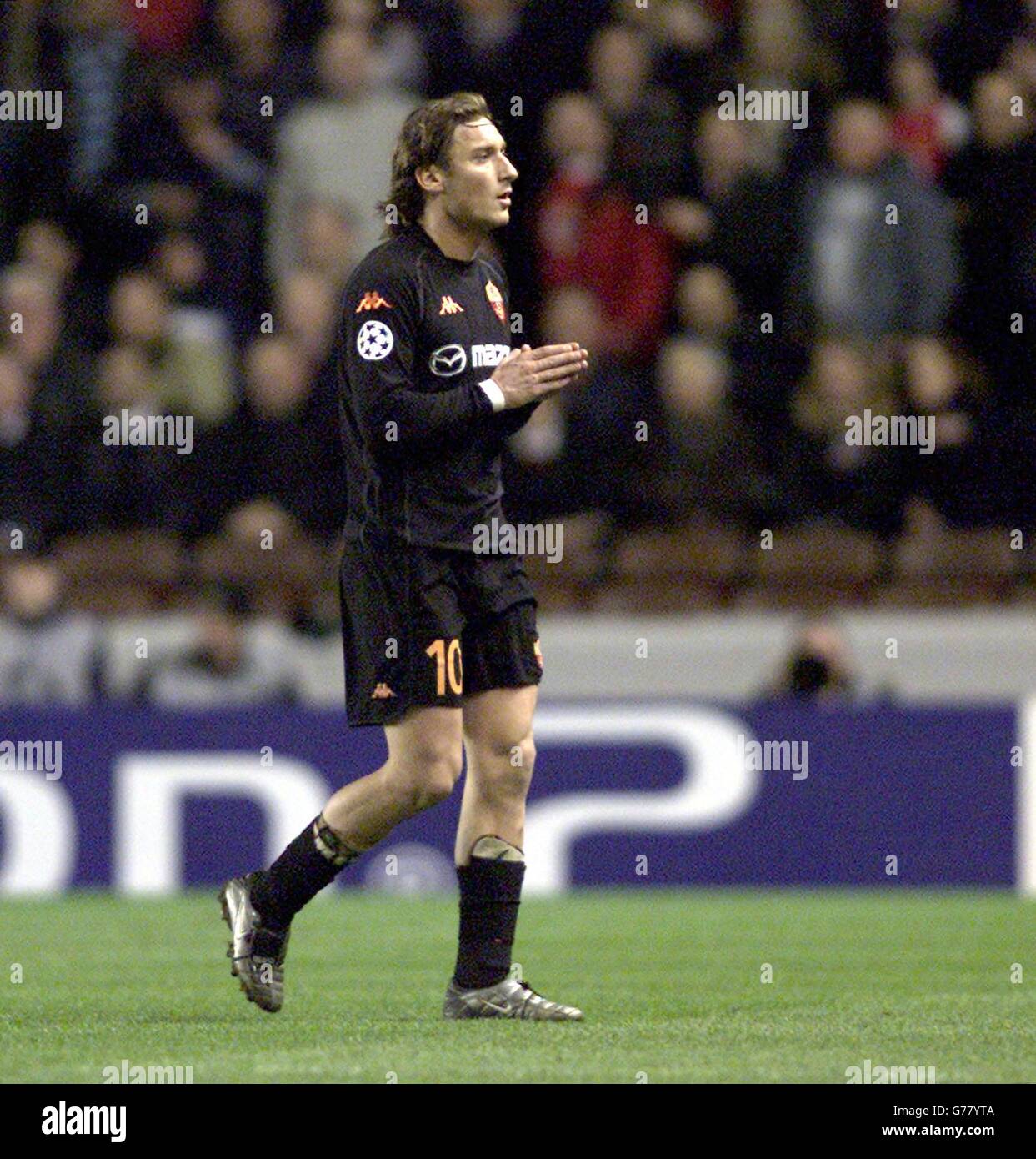 Roma's Francesco Totti protests his inocence after being shown the red ...