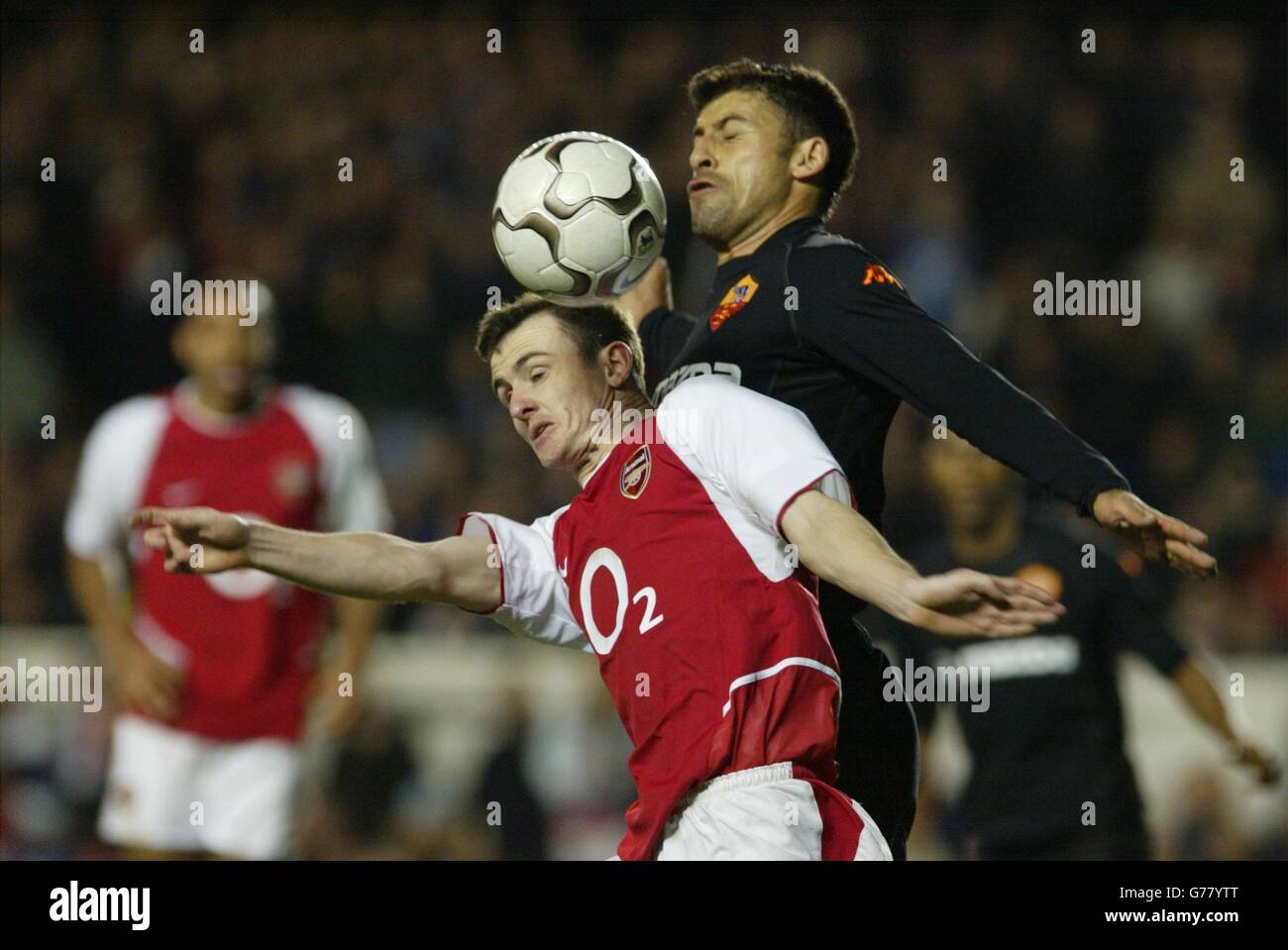 Roma's Walter Samuel and Arsenal's Francis Jeffers, during their ...