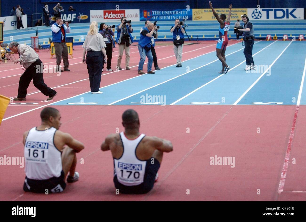 Great Britain's vanquished sprinters Jason Gardener (161) and Mark ...