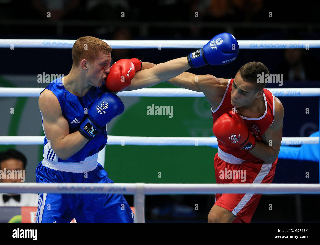 Scotland's Scott Forrest (blue) in action against New Zealand's David ...