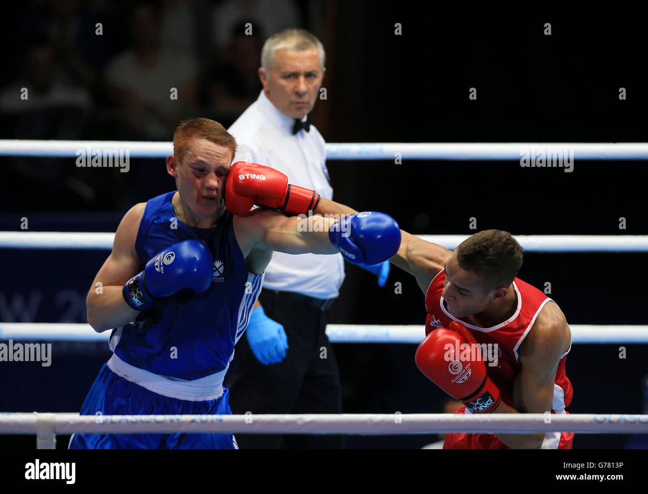 Scotland's Scott Forrest (blue) in action against New Zealand's David ...