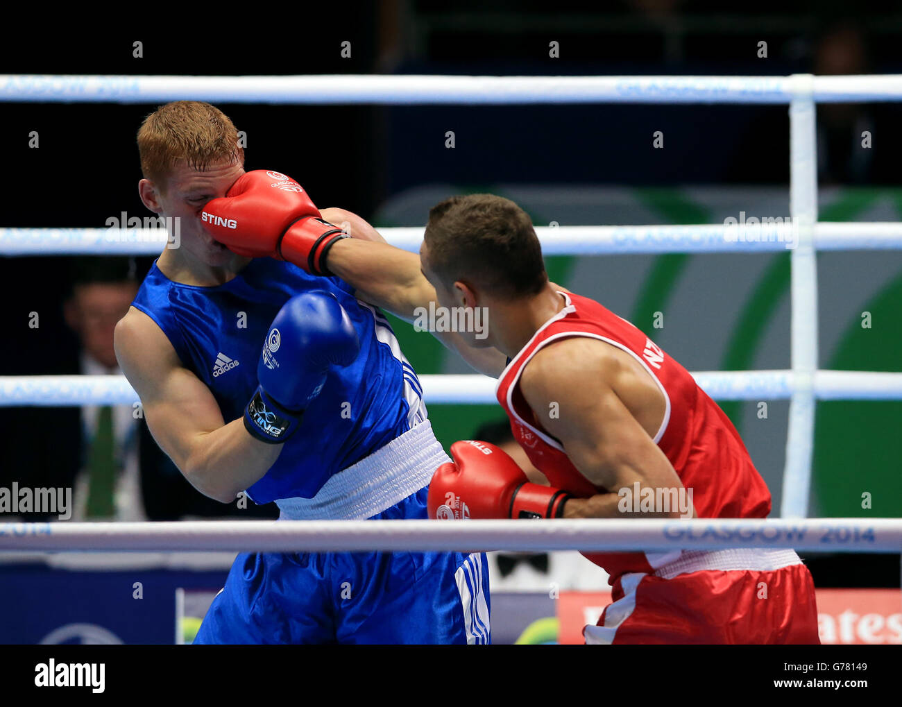 Scotland's Scott Forrest (blue) in action against New Zealand's David ...
