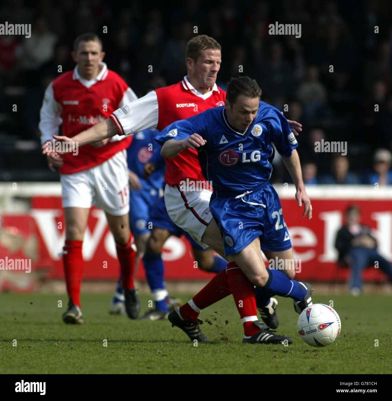 Leicester City's Paul Dickov (front) is challeneged by Rotherham United ...
