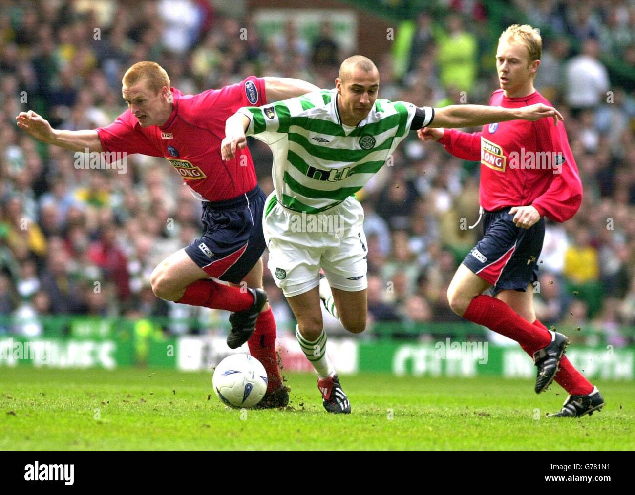Celtic's Henrik Larsson challenges Kilmarnock's Alan Mahood and Greg ...