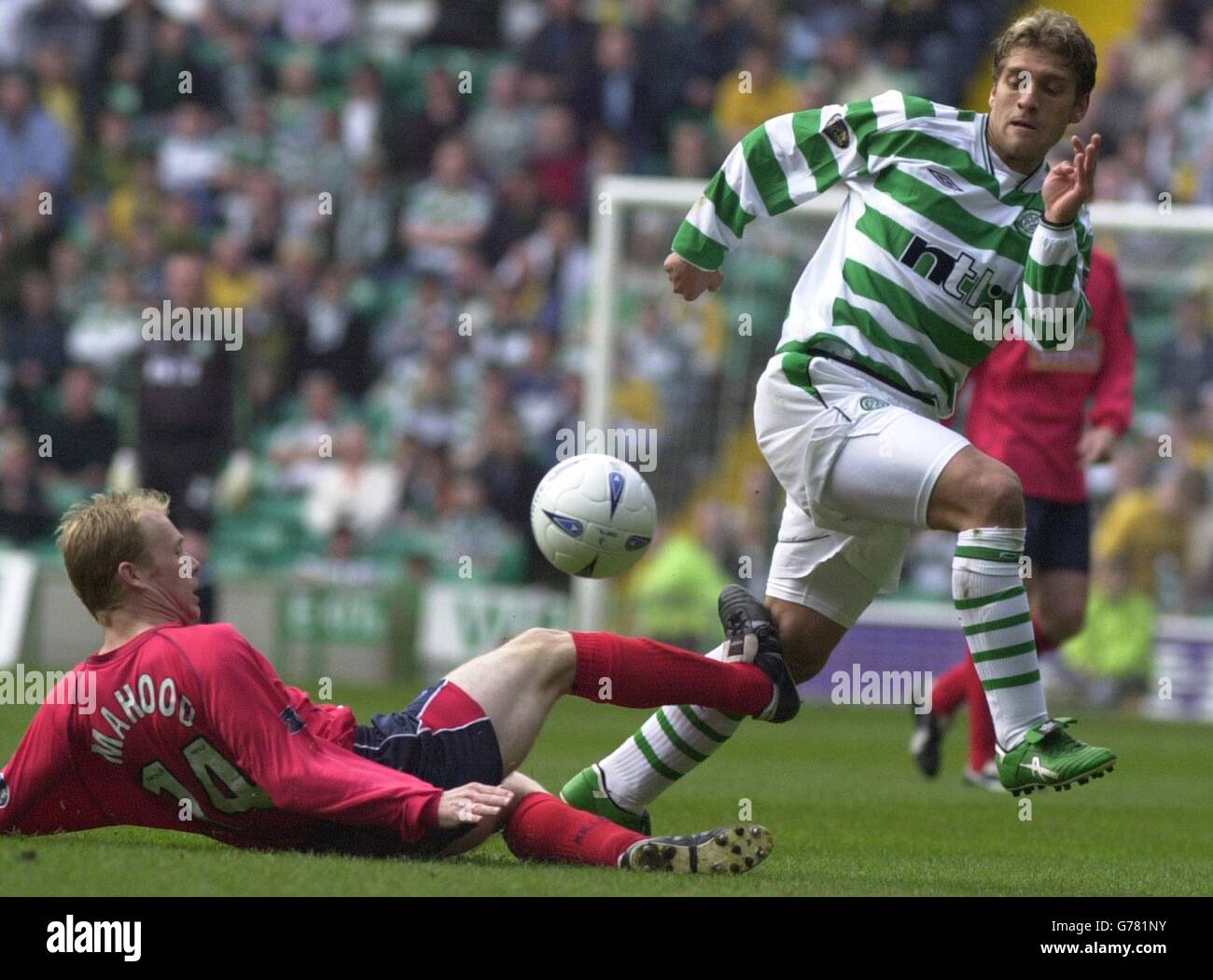 Celtic's Stilian Petrov is tackled by Kilmarnock's Alan Mahood during ...