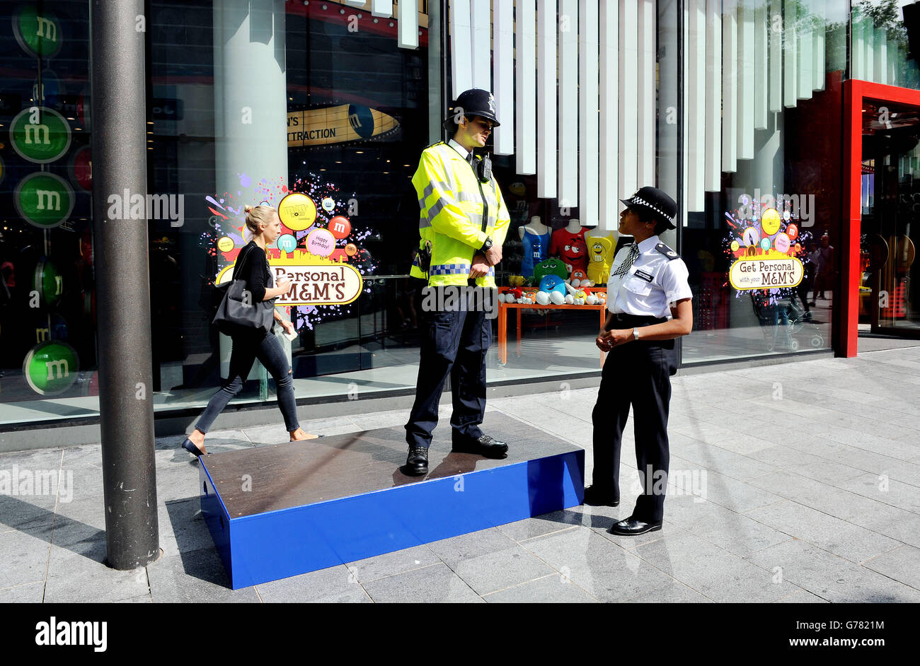 A Metropolitan police officer stands on a new 'podium' watch block, as ...