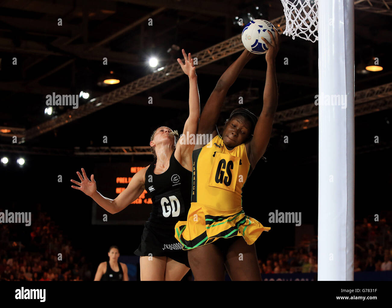 Jamaica's Jhaniele Fowler-Reid shoots past New Zealand's Casey Kopua ...