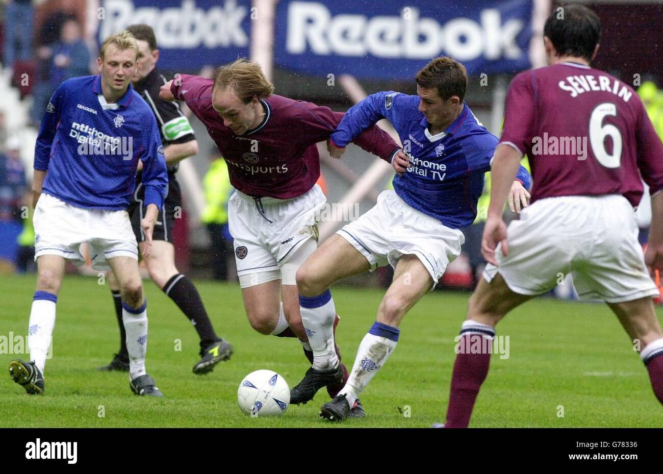 Ranger's Barry Ferguson challenges Hearts Neil Macfarlane during the ...