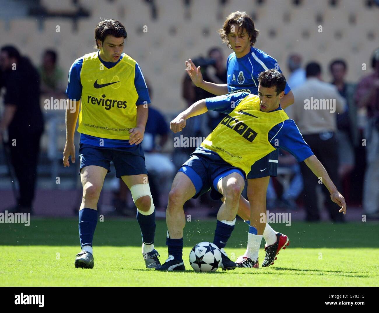 FC Porto forward Castanheira (with ball) and Cesar Peixoto (left) and ...