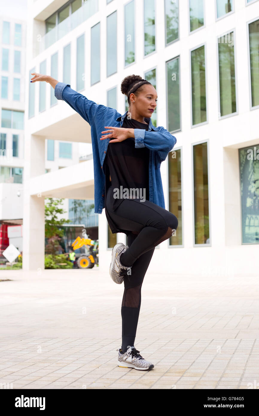 young woman dancing in the street Stock Photo - Alamy