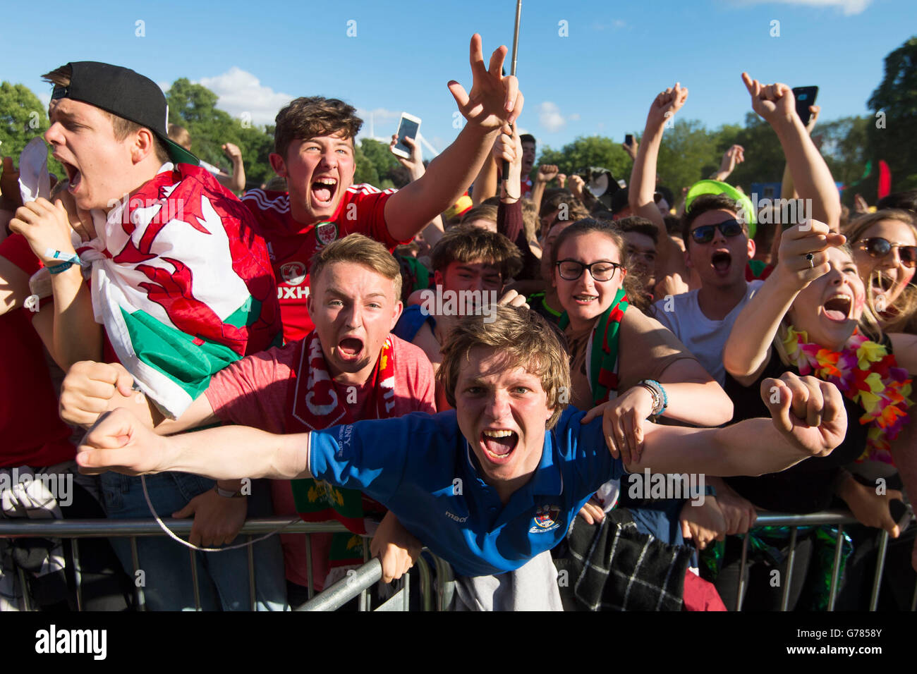 Welsh football fans celebrate in the Cardiff fan zone in Coopers Field ...