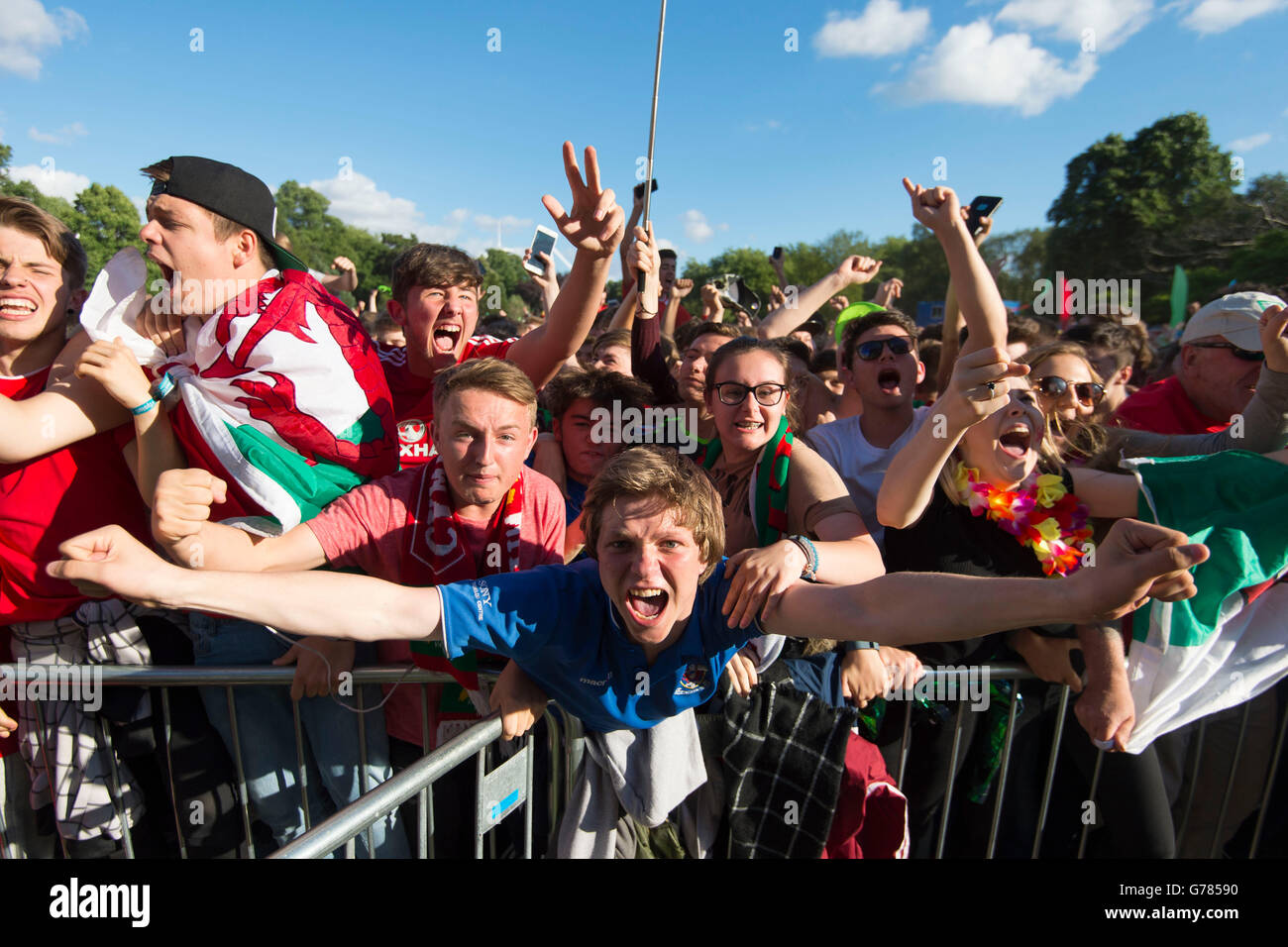 Welsh football fans celebrate in the Cardiff fan zone in Coopers Field ...