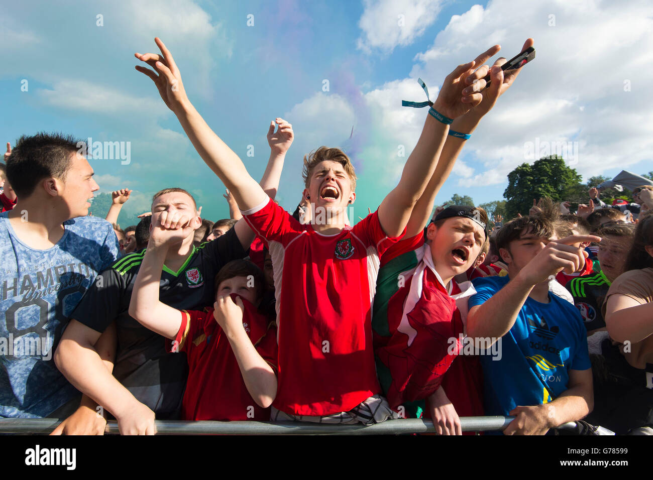 Welsh football fans celebrate in the Cardiff fan zone in Coopers Field ...