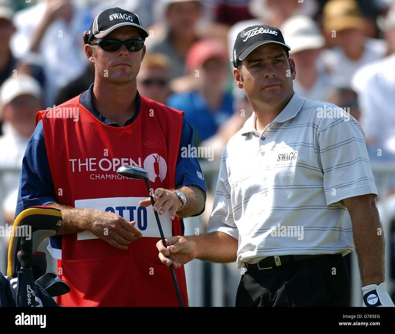 South African Hennie Otto with his caddy on the first tees ,in the ...