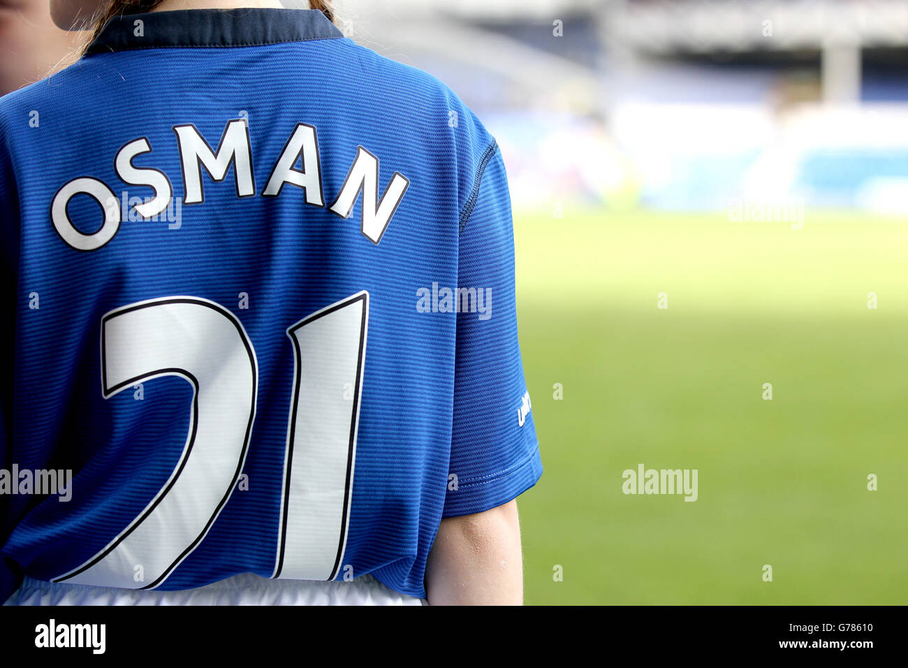 The name of Everton's Leon Osman on the back of a mascot's shirt Stock ...