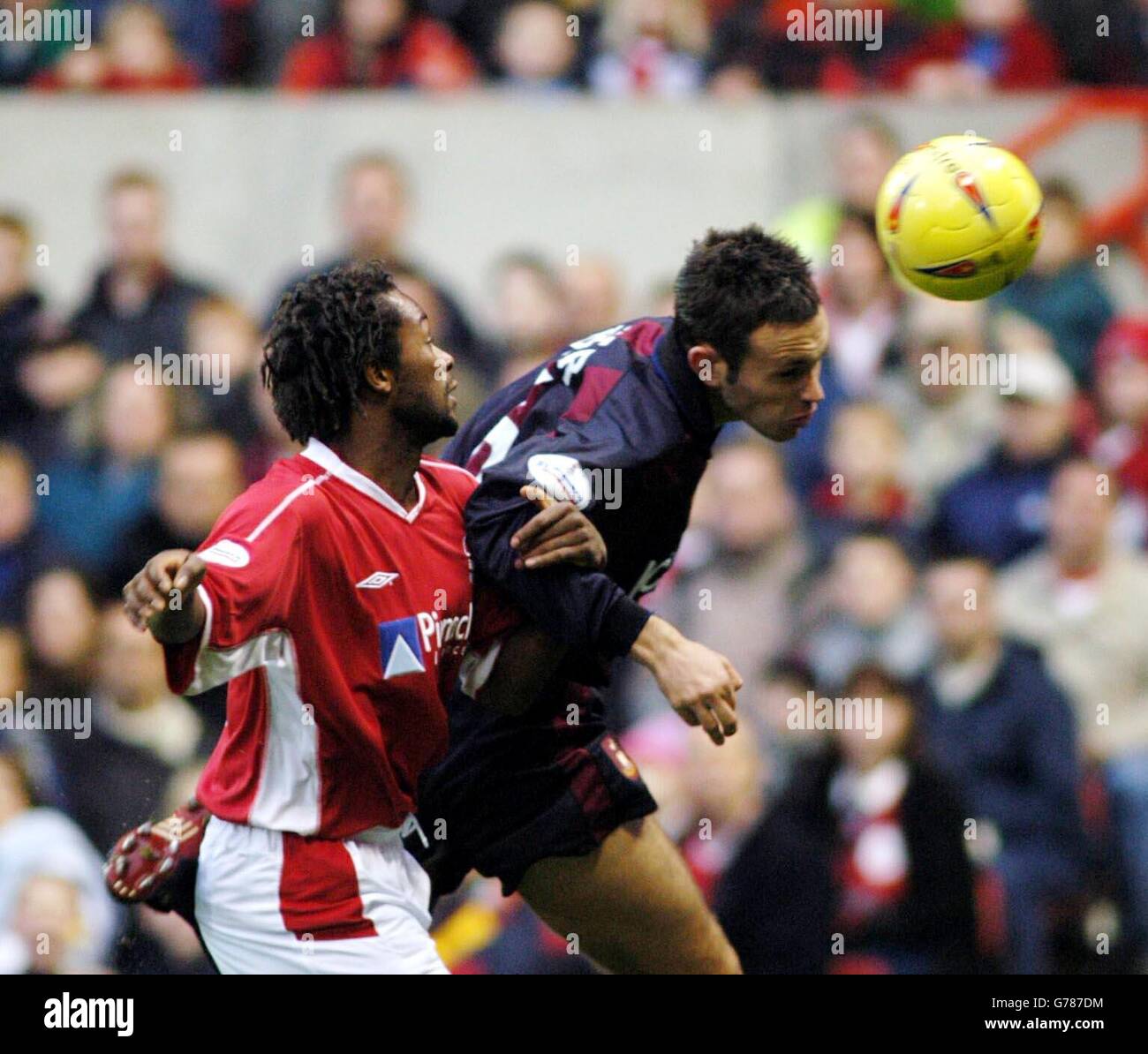 Nottingham Forest striker David Johnson (left) battles for the ball ...
