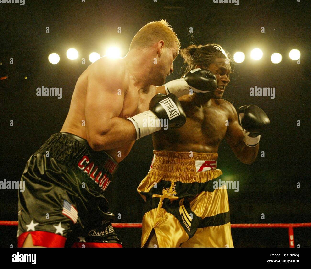 Britain's Audley Harrison (right) is hurt with big left hand punch to ...