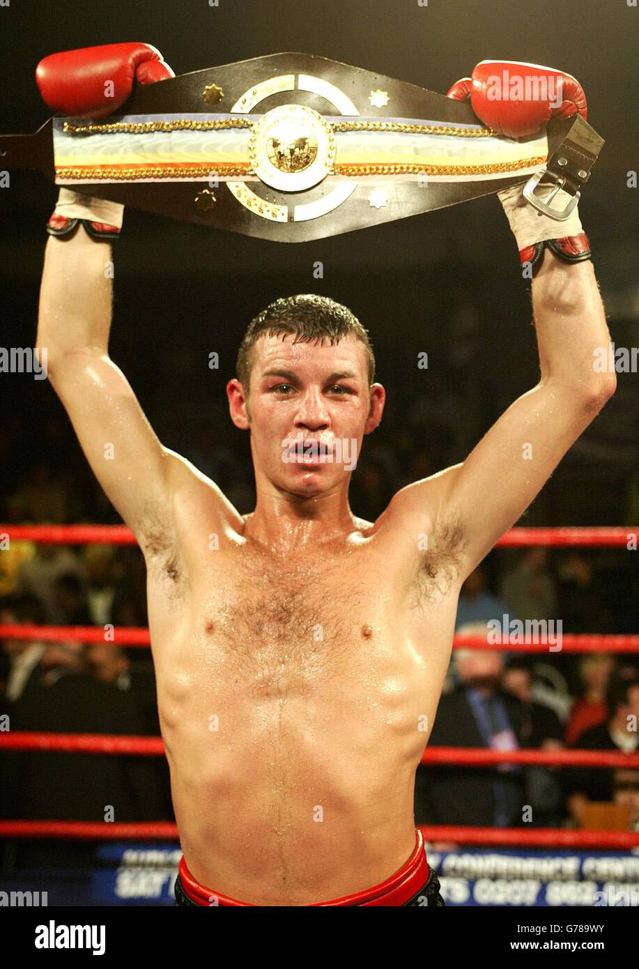 Nicky Cook from Dagenham holds the Commonwealth belt aloft after ...