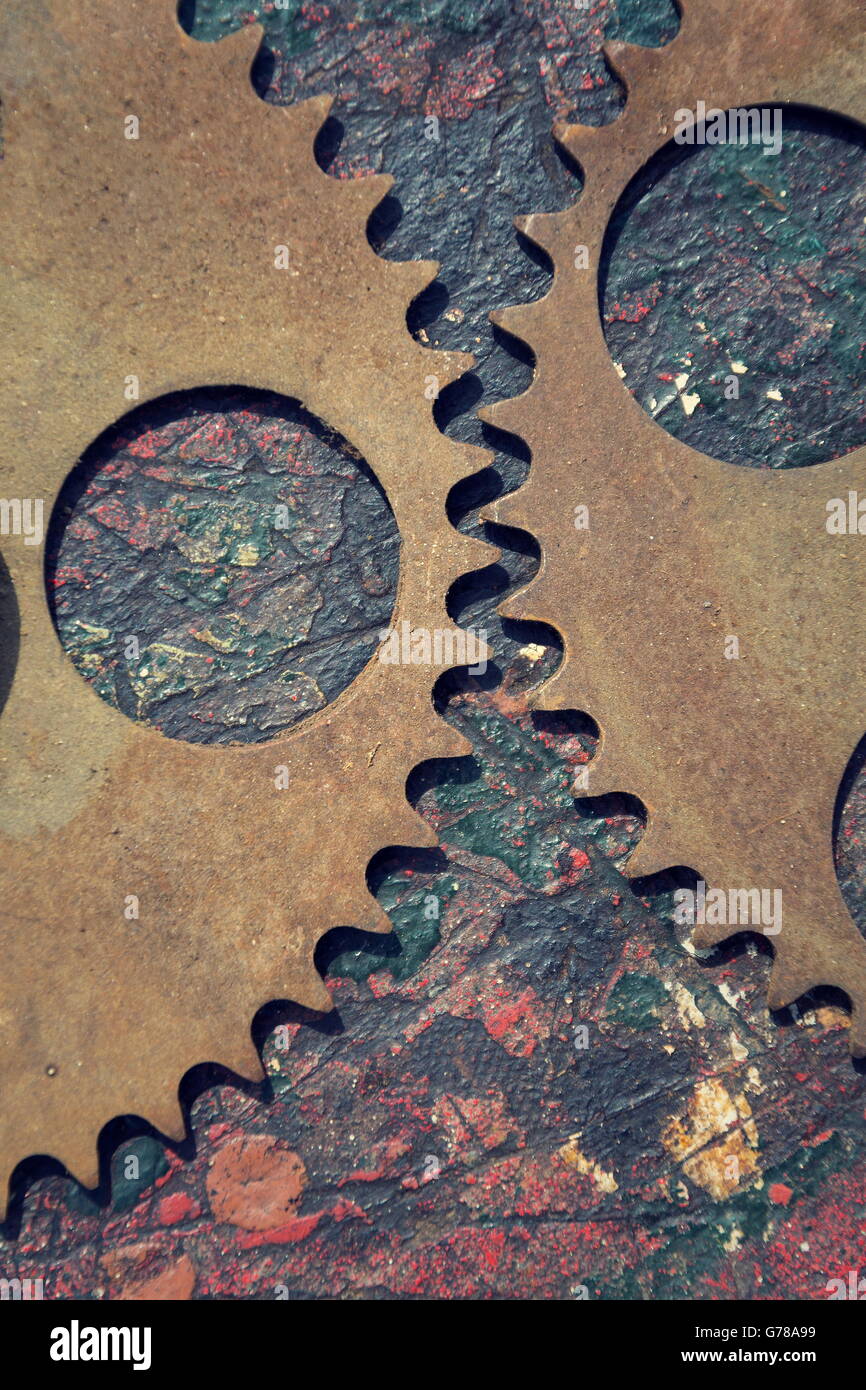 Filtered picture of cogwheels on a colorful wooden background Stock ...