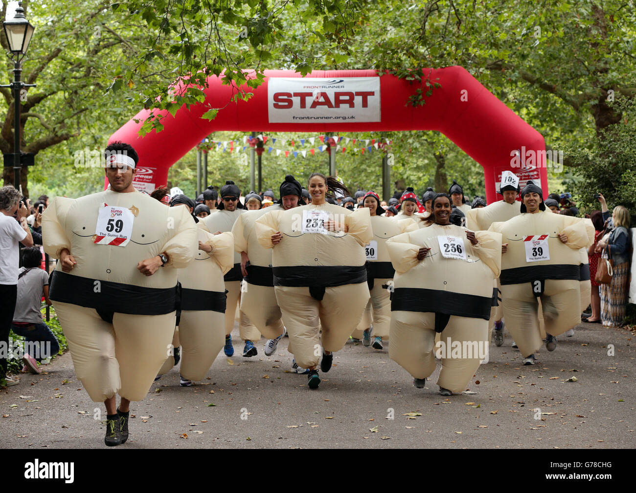 Participants start the Sumo Run - a 5km charity fun run for runners ...