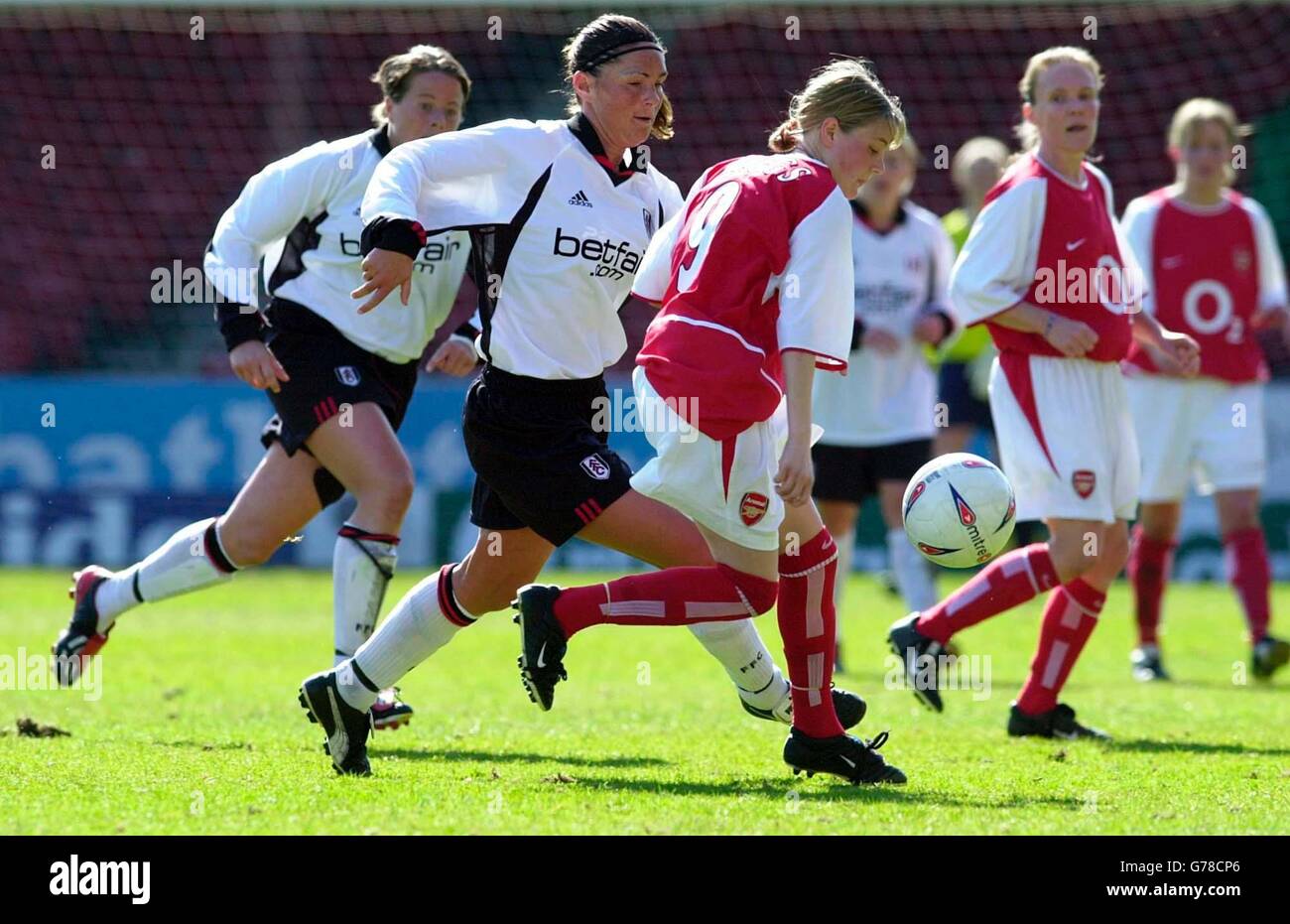 Arsenal's Ellen Maggs is marked by Fulham's Katrine Pederson during the ...