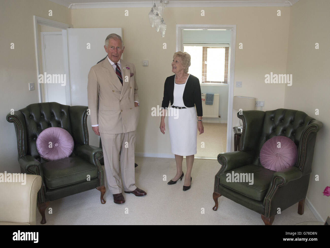 The Prince of Wales with Dianne Ray in her apartment as he visits the ...