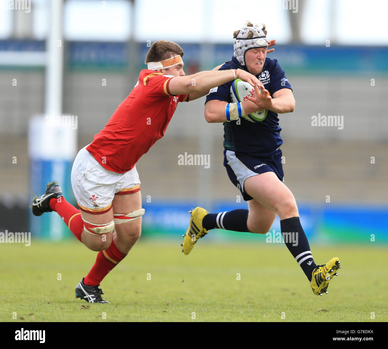 Scotland's Lewis Anderson is tackled by Wales Morgan Sieniawski during ...