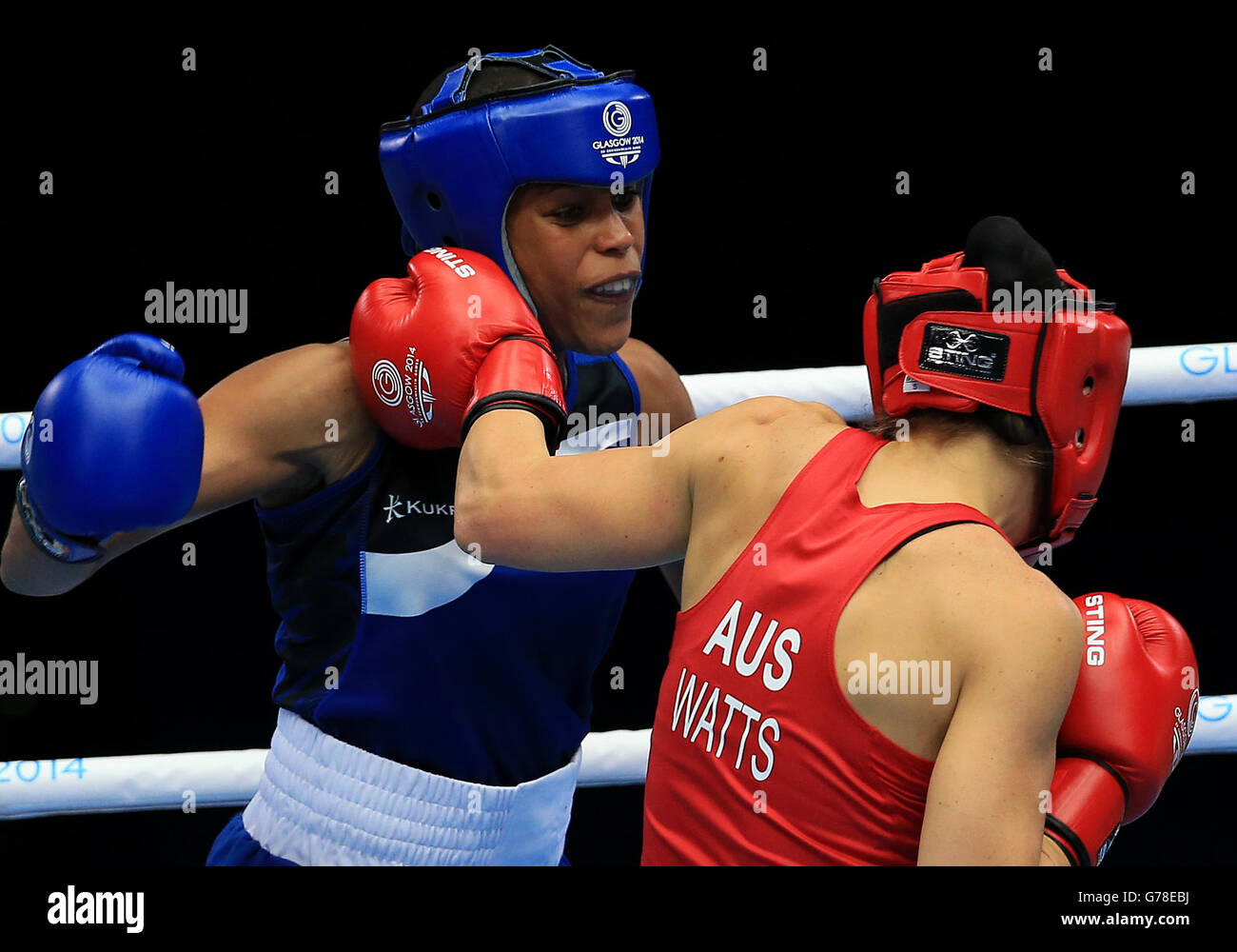 Australia's Shelly Watts (right) competes in the women's light 57-60Kg ...