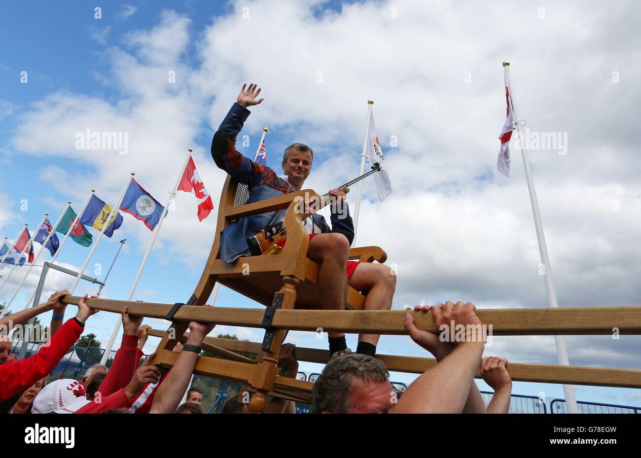 England's David Luckman is carried away from the shooting range by his ...