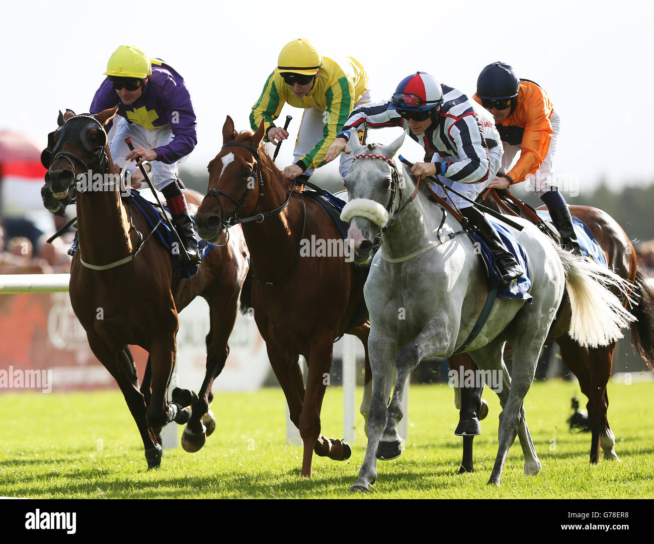 Vastonea ridden by Gary Halpin (second right) crosses the finish to win ...
