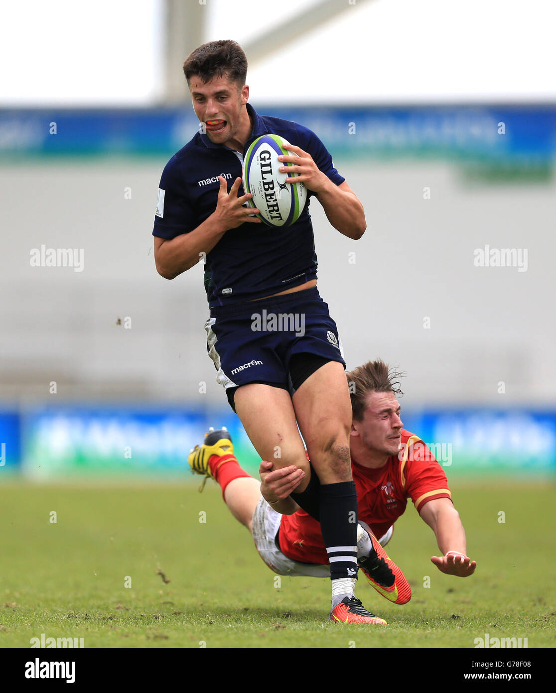 Scotland's Adam Hastings is tackled by Wales Harri Millard during the ...