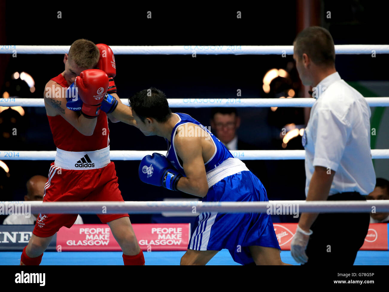 Wales' Ashley Williams (red) in action against India's Devendro ...