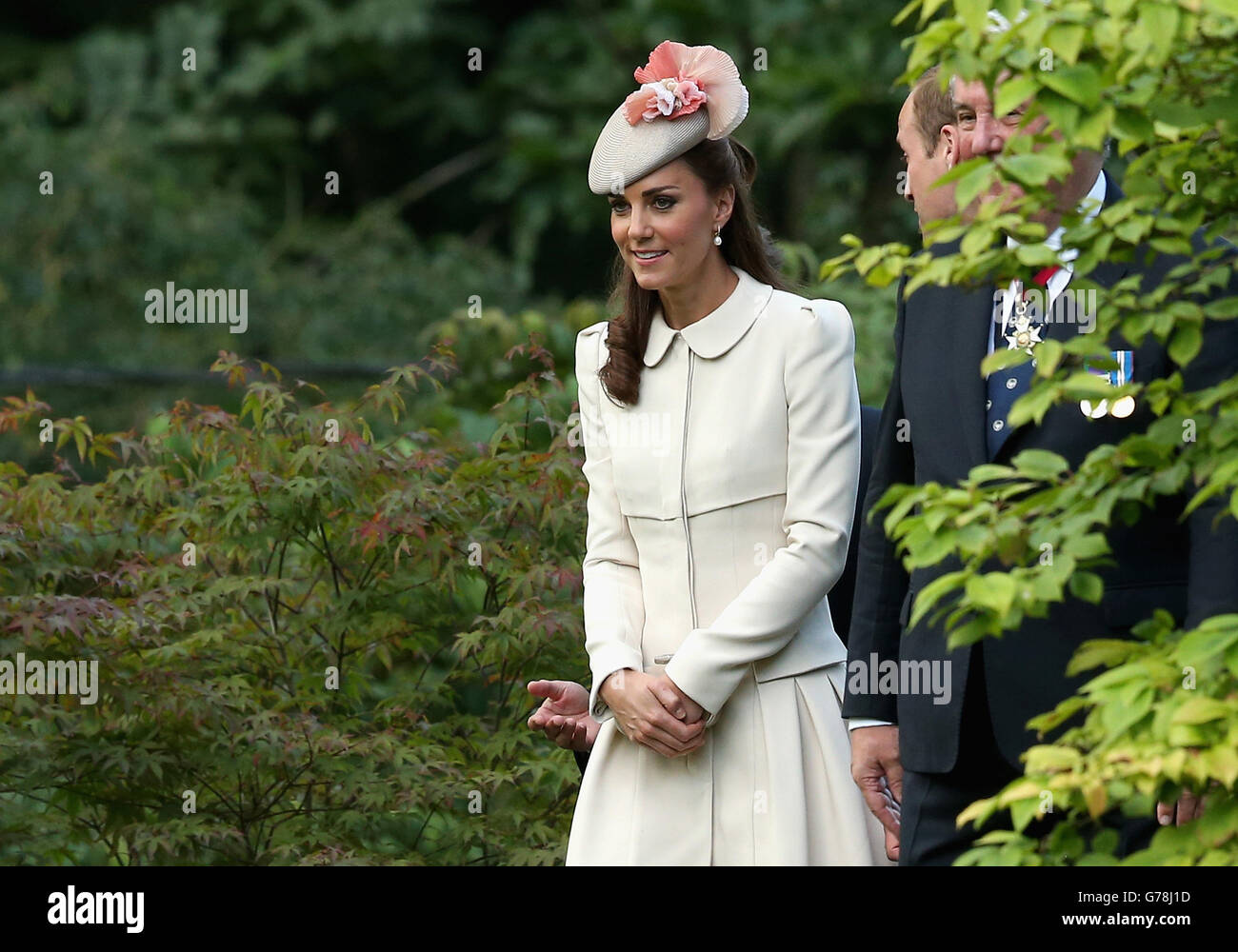 The Duchess of Cambridge looks at war graves at St Symphorien Military ...