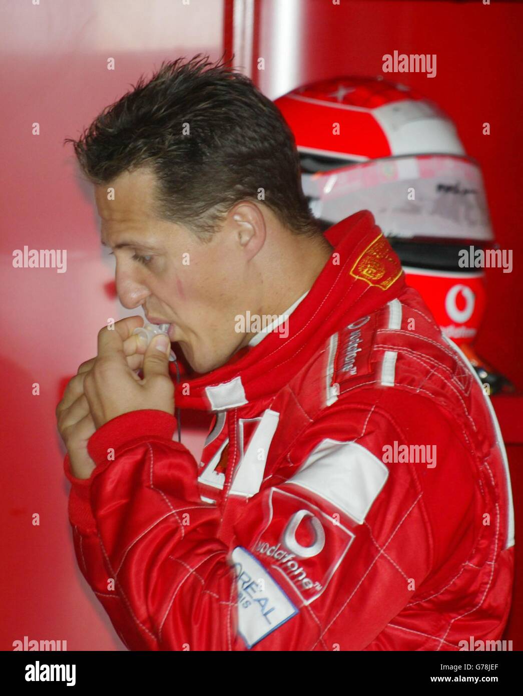 German Michael Schumacher prepares in the Ferrari pit for the free ...