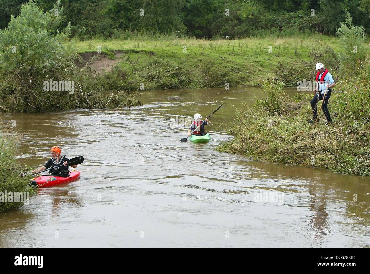 Searching for boy in the River Bollin Stock Photo - Alamy