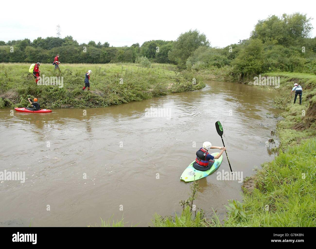Searching for boy in the River Bollin Stock Photo - Alamy