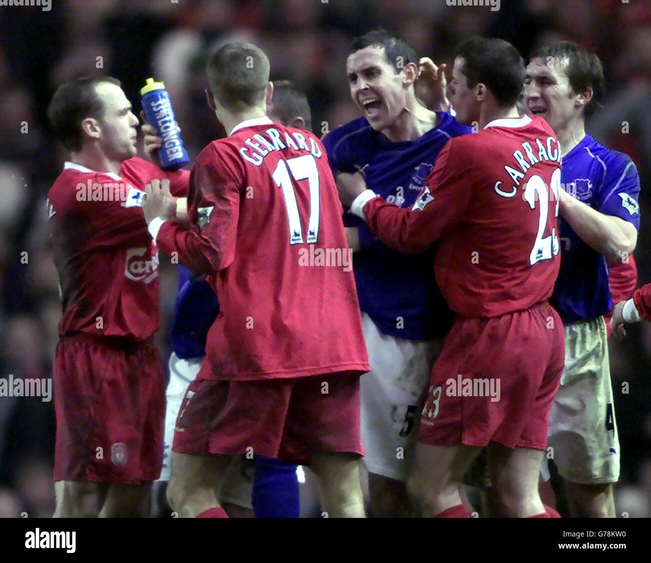 Everton's David Weir (centre right) shouts at Liverpool's Steven ...