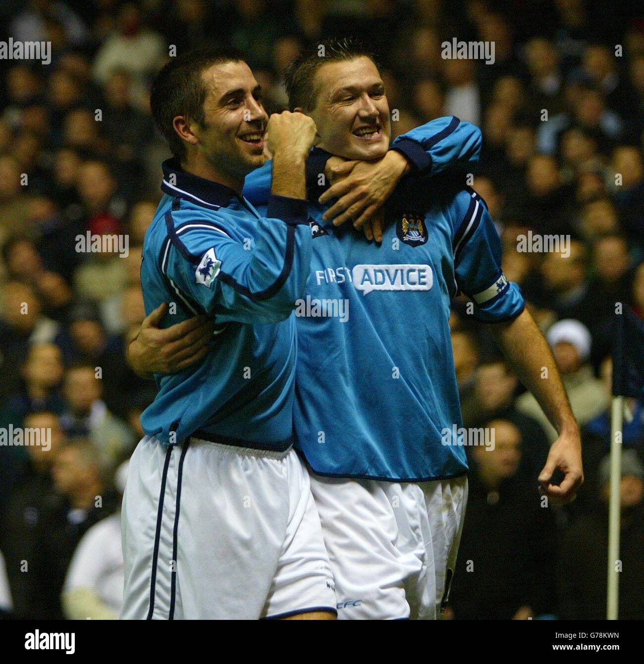 Manchester City's Steve Howey (right) celebrates scoring against ...