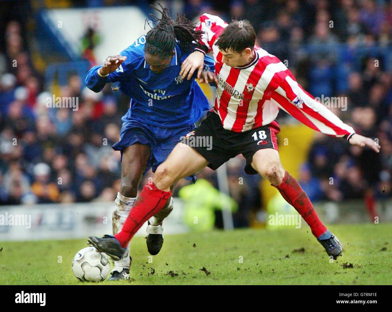 Chelsea's Mario Melchiot (L) is tackled by Rory Delap of Southampton ...