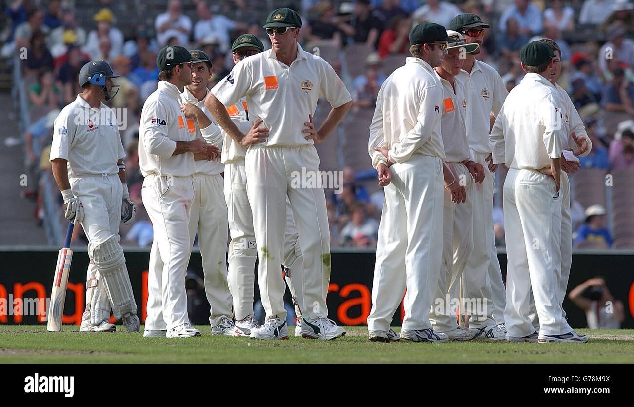 England captain Nasser Hussain waits for the third umpire decision with ...