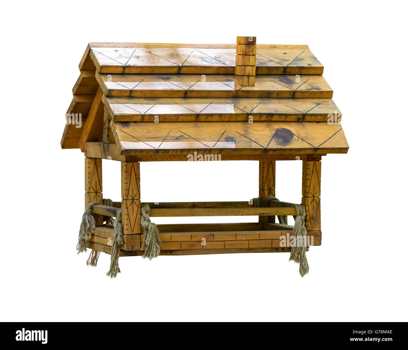 wooden house manger isolated on white background Stock Photo - Alamy