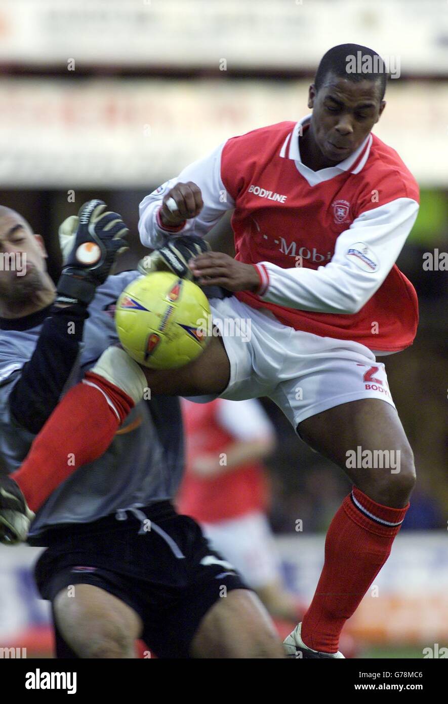 Rotherham's Darren Byfield in action against Millwall's goalkeeper Tony ...