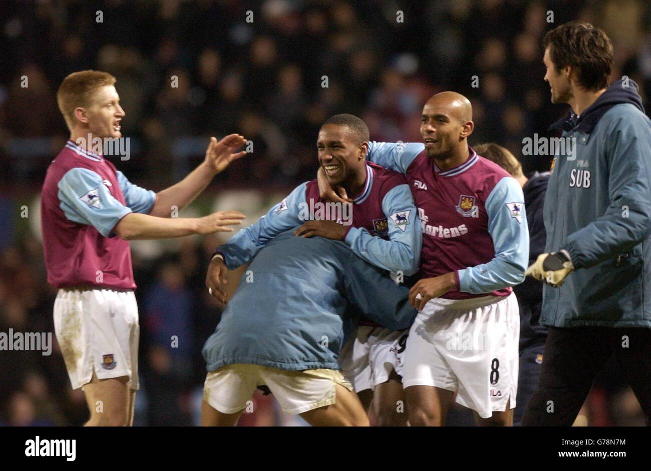West Ham team mates congratulate Jermain Defoe, centre, as his last ...