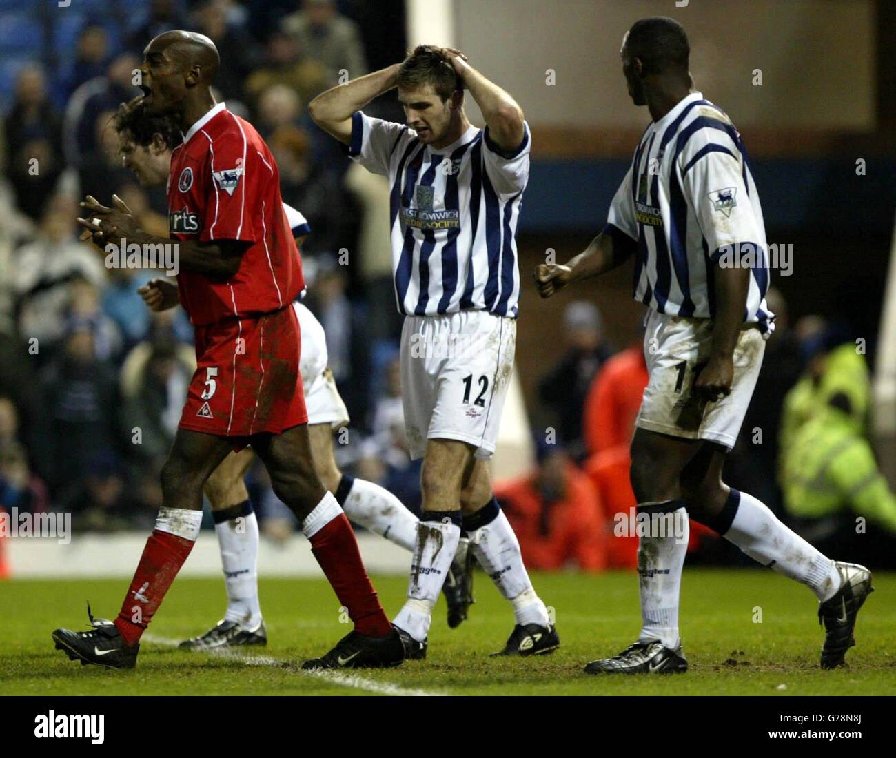 West Bromwich Albion striker Scott Dobie (centre) shows his dejection ...