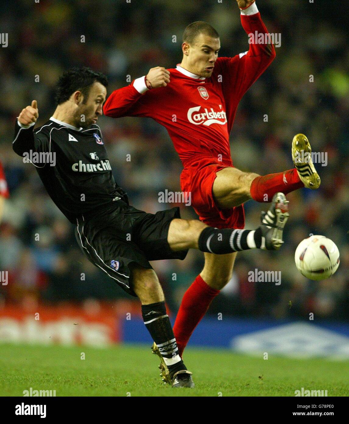 Liverpool's Bruno Cheyrou (right) challenges Shaun Derry of Crystal ...