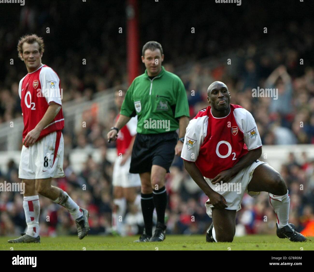 Arsenal defender Sol Campbell (right) has a smile after his rare shot ...