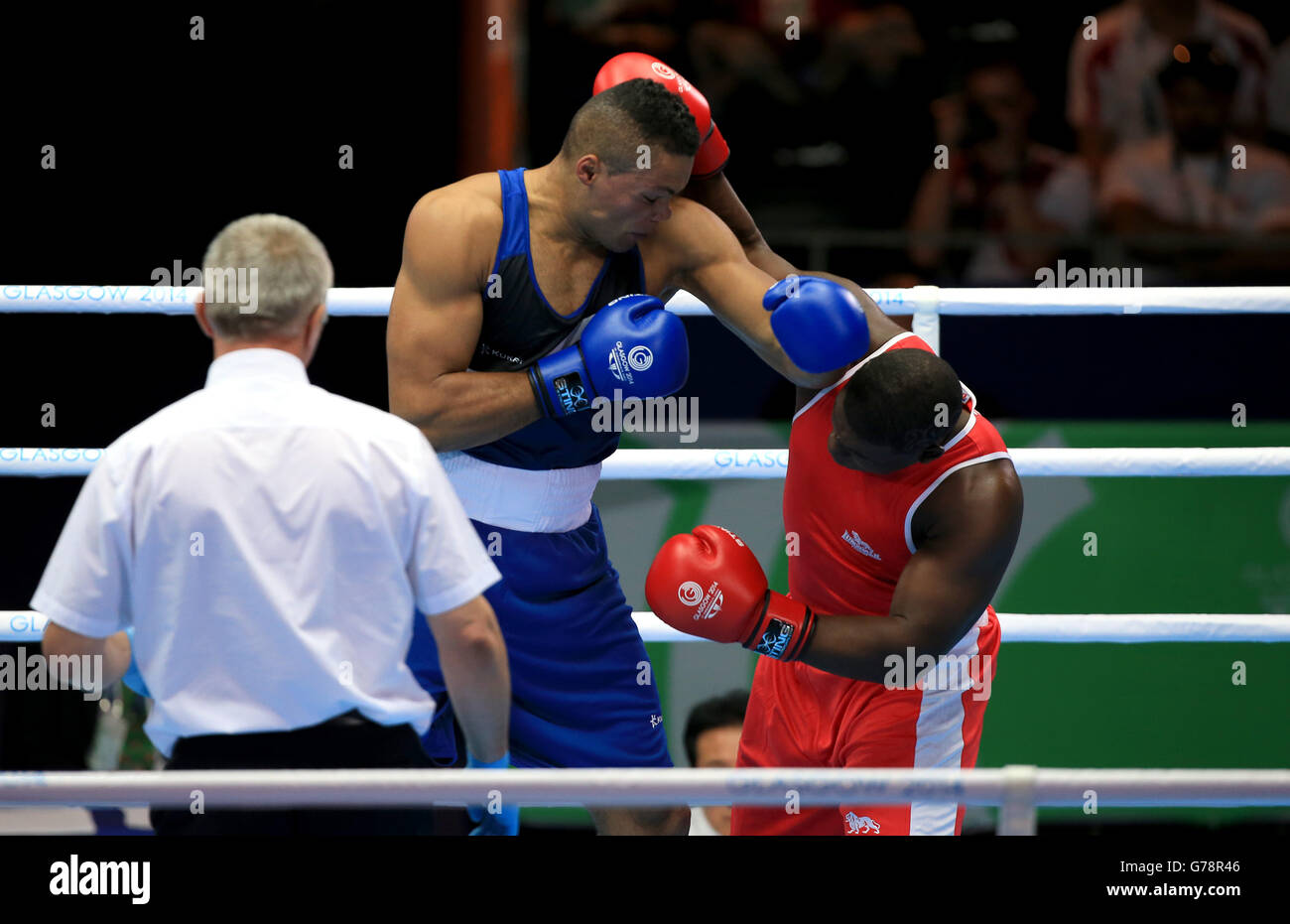 Sport - 2014 Commonwealth Games - Day Two. England's Joseph Joyce (left ...