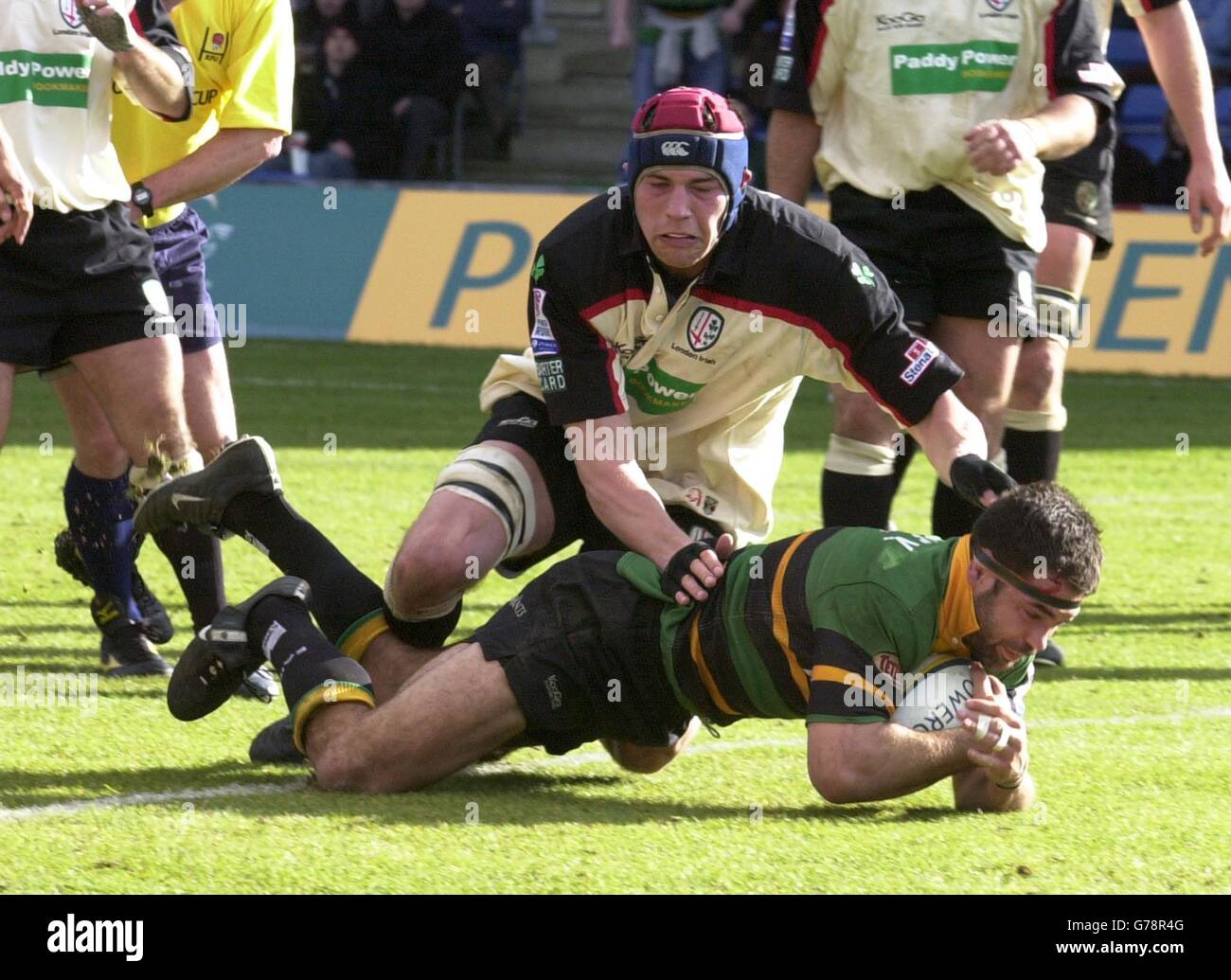 Bob Casey of London Irish fails to tackle Budge Pountney of Northampton ...