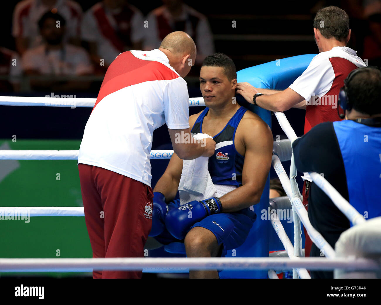 England's Joseph Joyce on his stool in between rounds against ...