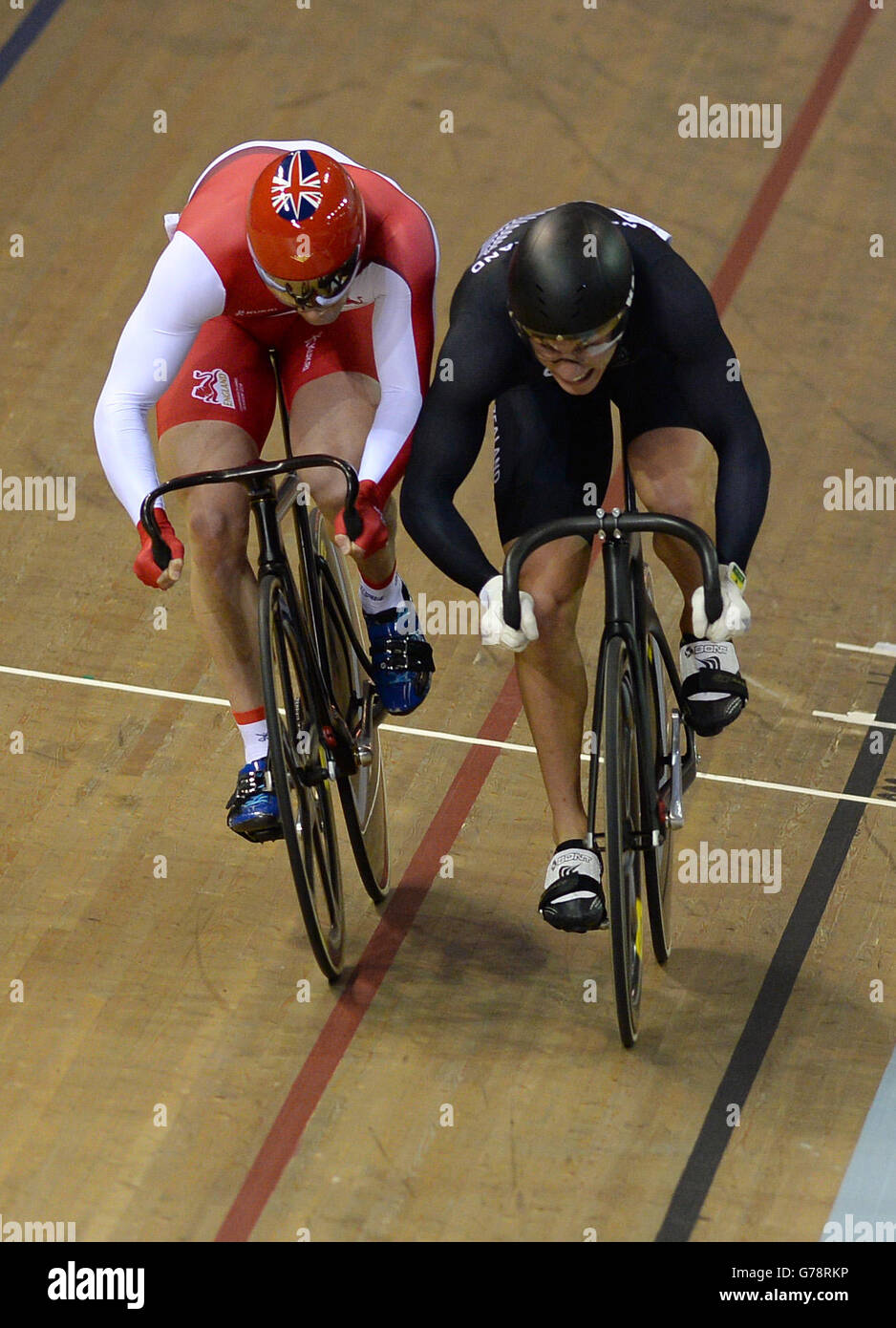 England's Jason Kenny (left) and New Zealand's Sam Webster come close ...